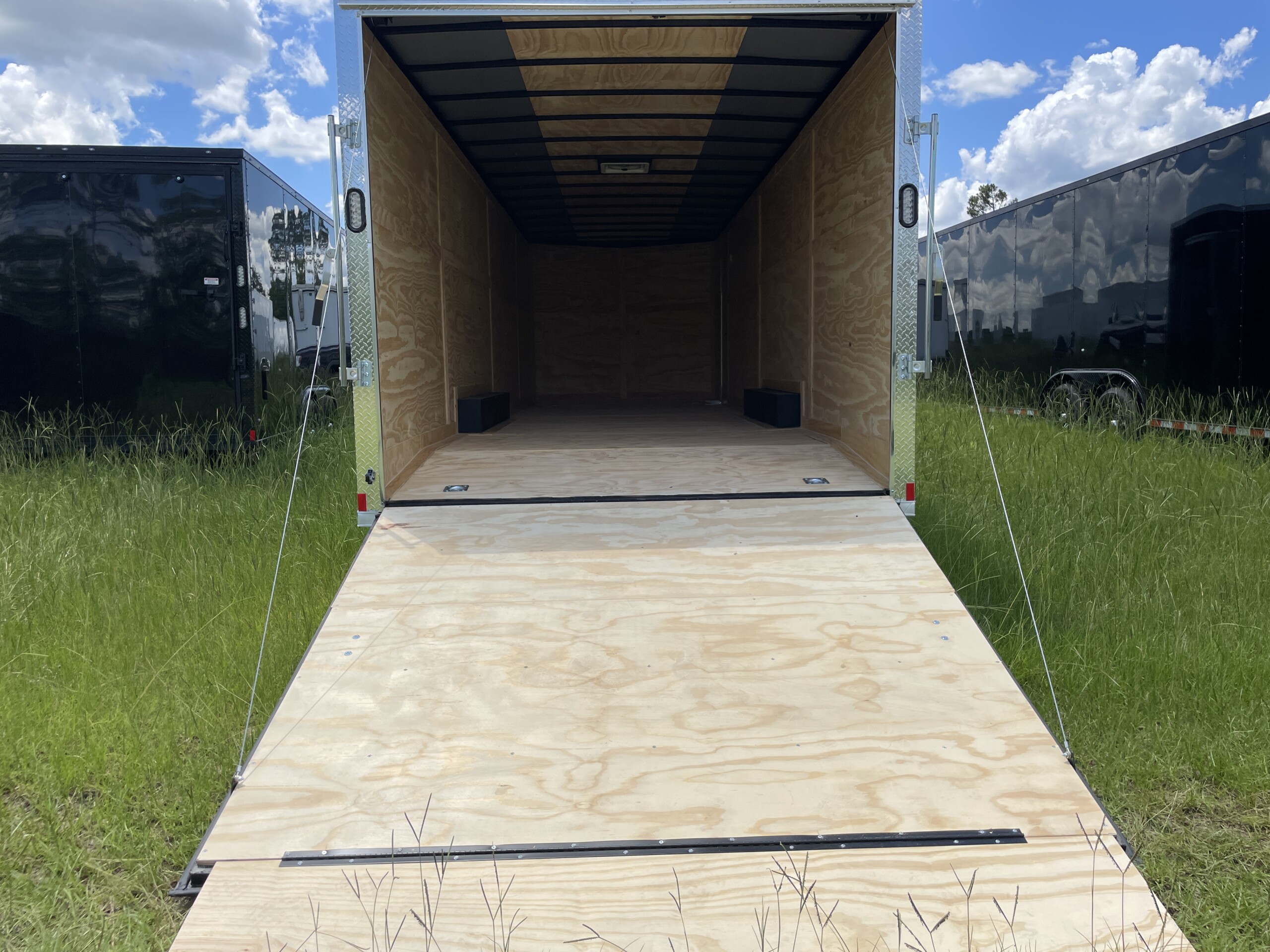 8.5 X 28 TA CUSTOM ENCLOSED TRAILER - ROCK SOLID CARGO CLEARANCE